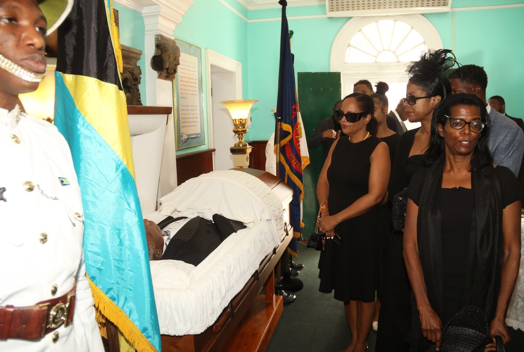 Family members, at Lie-in-State ceremonies for the late Hon. A. Loftus ...