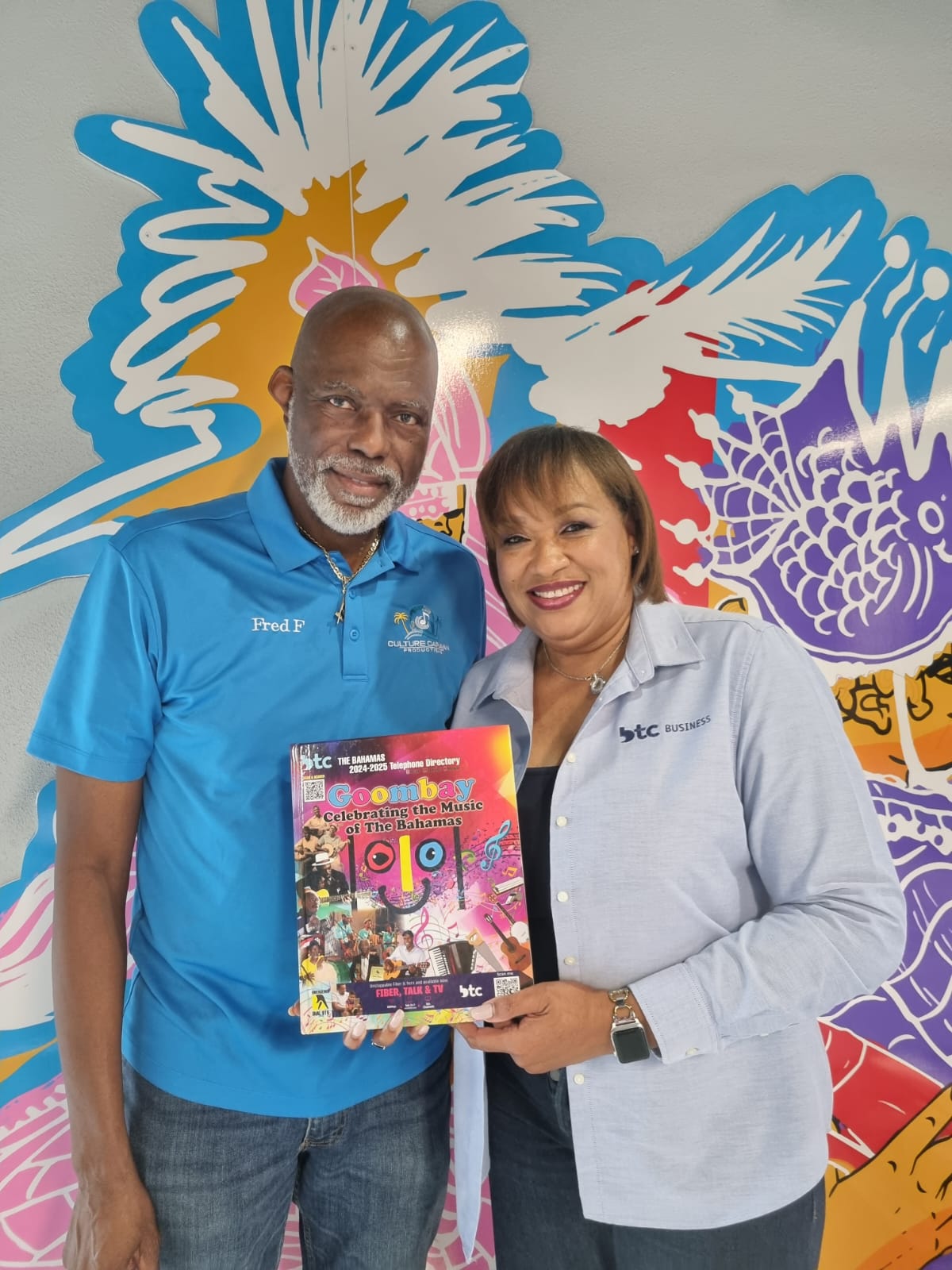 BTC presents entertainer Fred Ferguson with a hard copy of its 2024-25 ...