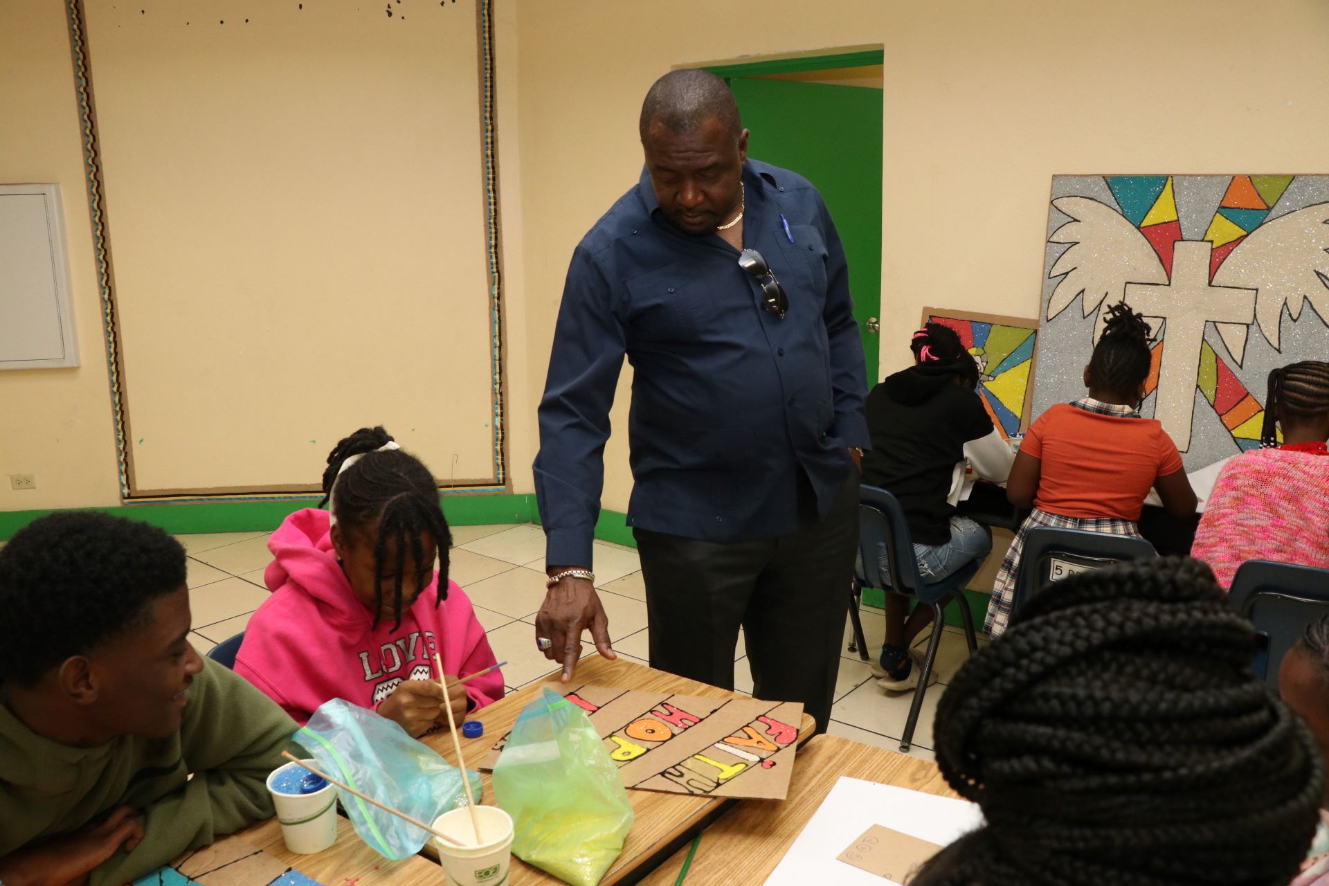 Minister Bowleg tours Culture and Swim summer camps - ZNS BAHAMAS