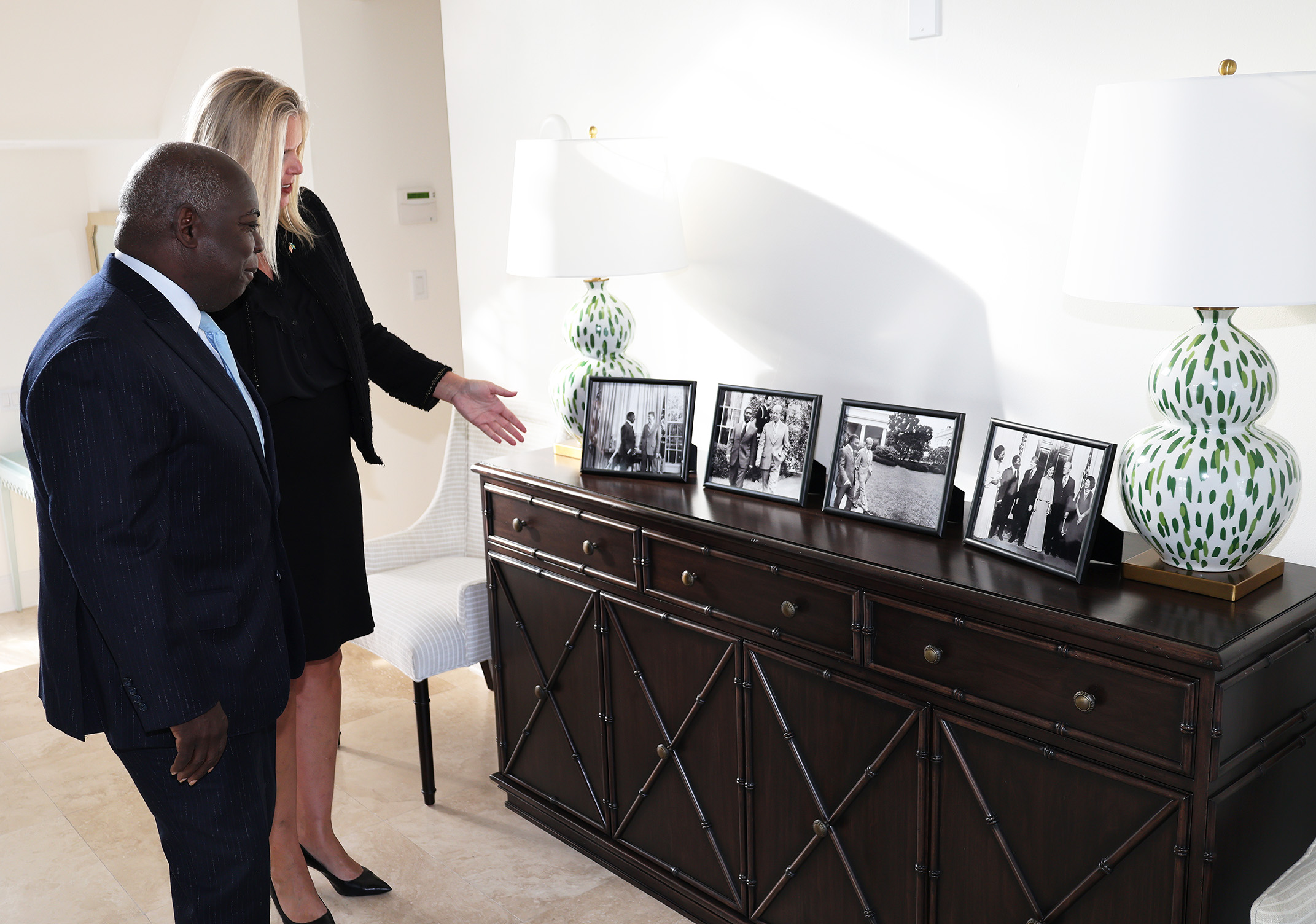 Prime Minister Philip Davis signs the Book of Condolence for Former US ...
