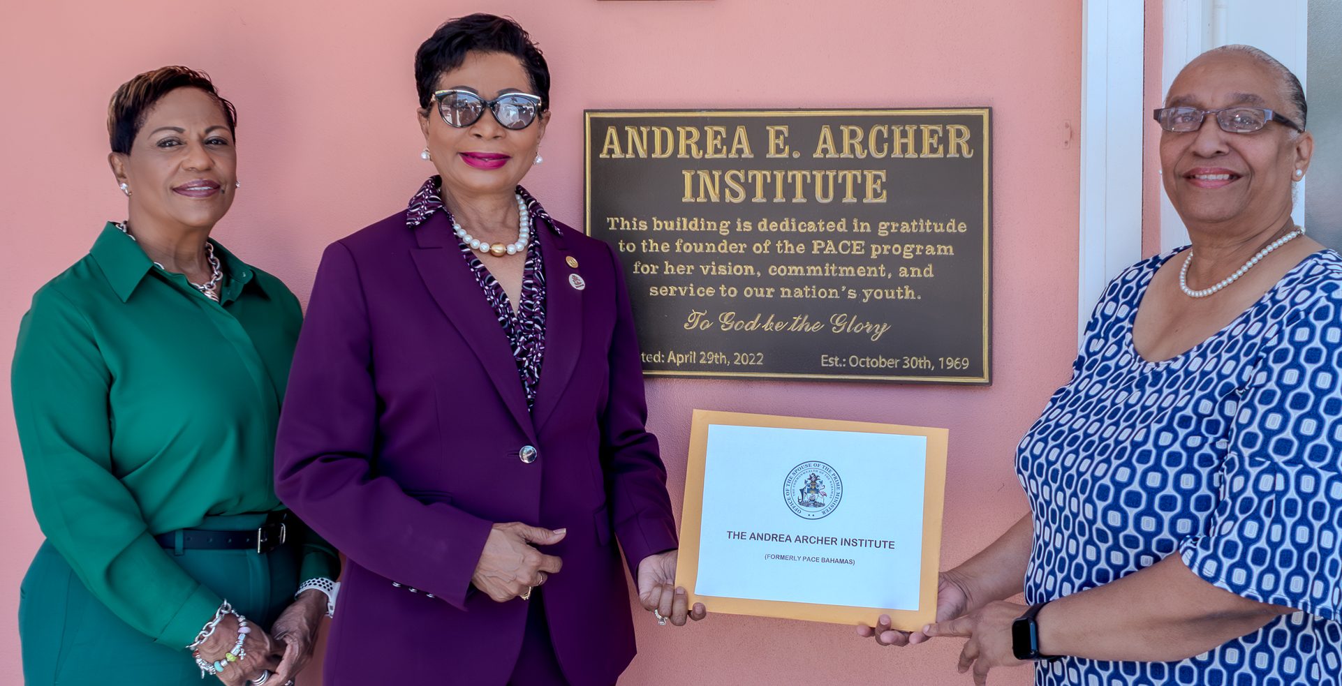 Mrs. Ann Marie Davis makes a donation of food vouchers to the Andrea E ...